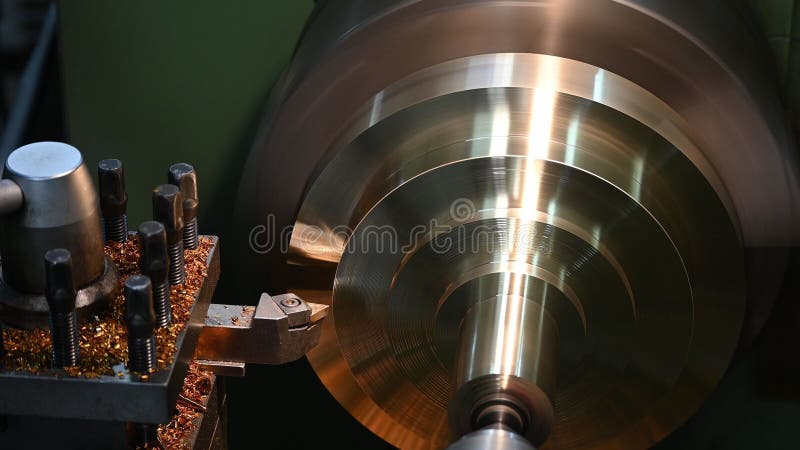 The Operation of Lathe Machine Cutting the Brass Shaft Parts with the ...