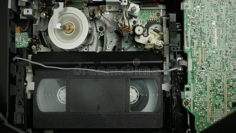 Operation of the Mechanism for Loading and Unloading Film in a VHS ...