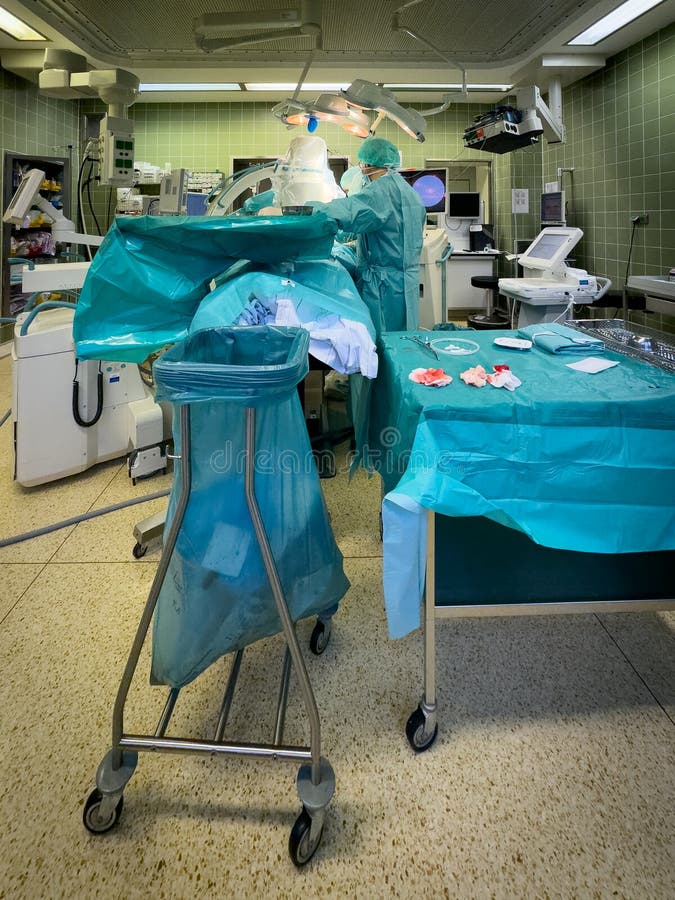 An Operation is Performed in a Hospital Operating Theatre Stock Photo ...