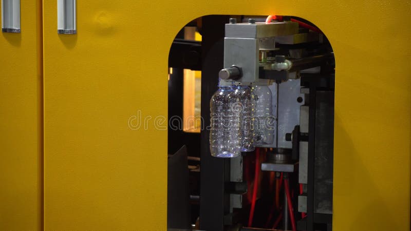 The Operation of Plastic Blowing Bottle Machine Stock Footage - Video ...
