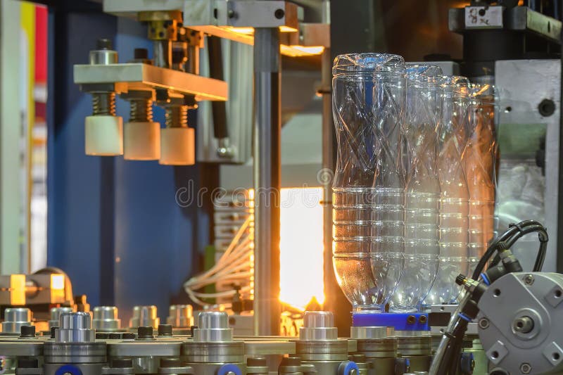 The Operation of Plastic Bottle Blowing Machine Stock Photo - Image of ...