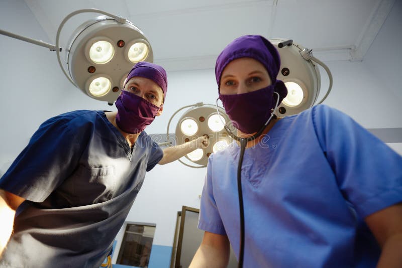 Operation Room with Medical Staff during Surgery Stock Image - Image of ...