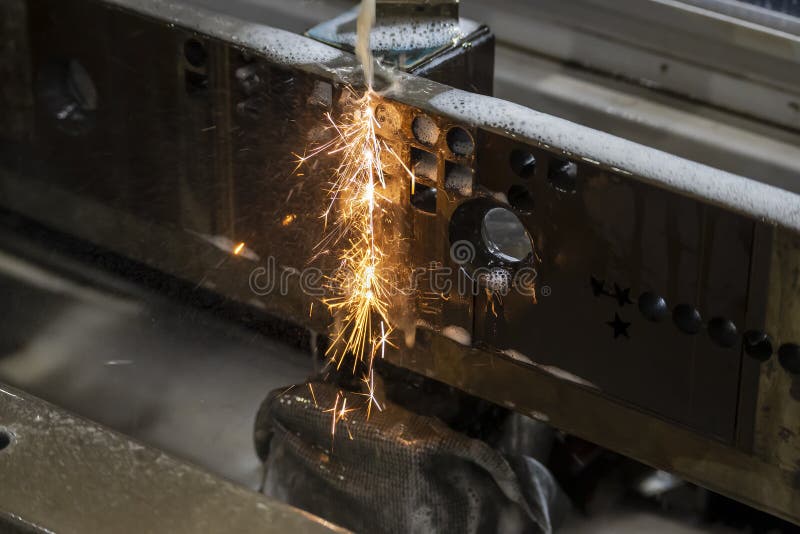 The Operation of Wire-EDM Machine Cutting the Die Insert Parts. Stock ...