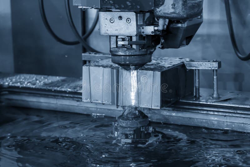 The Operation of Wire-EDM Machine Cutting the Die Insert Parts. Stock ...