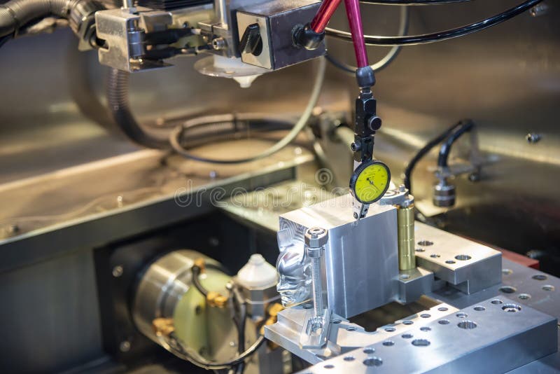 The Operation of Wire-EDM Setup with Dial Gauge. Stock Image - Image of ...