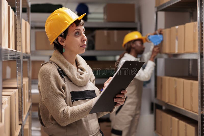 Operations Warehouse Manager Taking Notes in Stockroom Stock Image ...