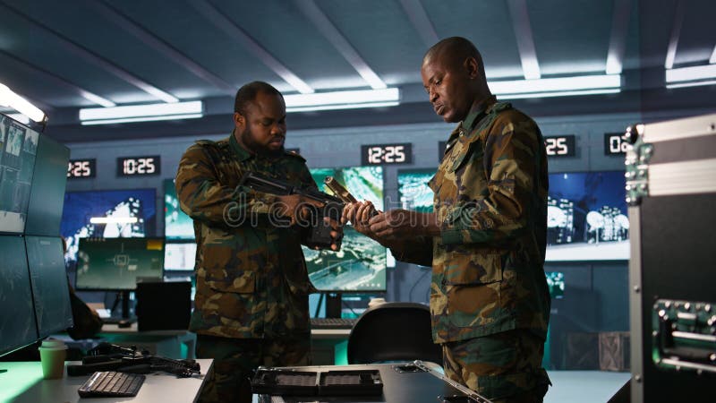 Close Up of Military Unit in Command Center Packing Handgun Stock Photo ...