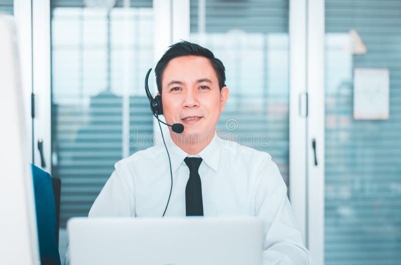 Operator Asian Smart Man Working with Headset at Workplace Stock Image ...