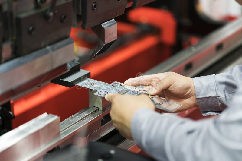 Operator Bending Metal Sheet by Sheet Bending Machine Stock Photo ...