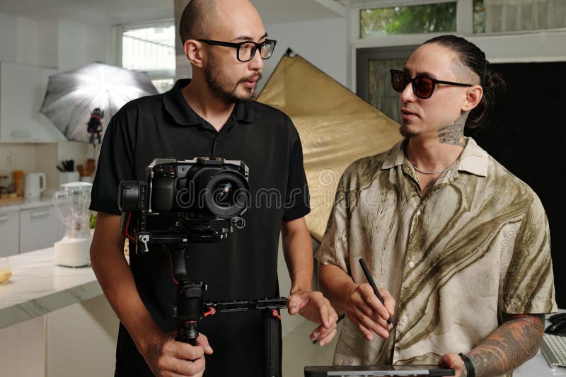 Operator Discussing Script with Director Stock Photo - Image of ...