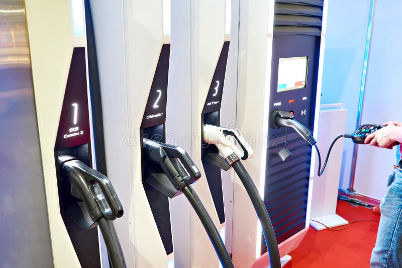 Operator and Charging Station for Electric Vehicles Stock Photo - Image ...
