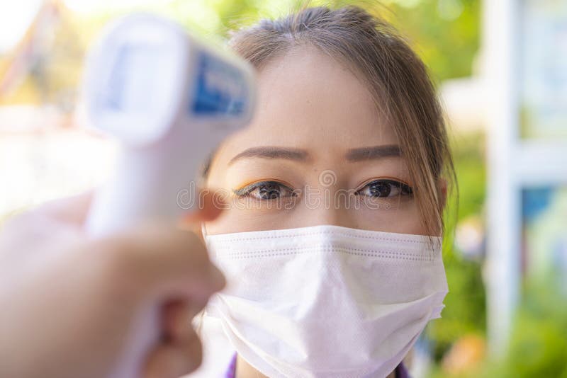 Operator Check Fever by Digital Thermometer Visitor at Information ...