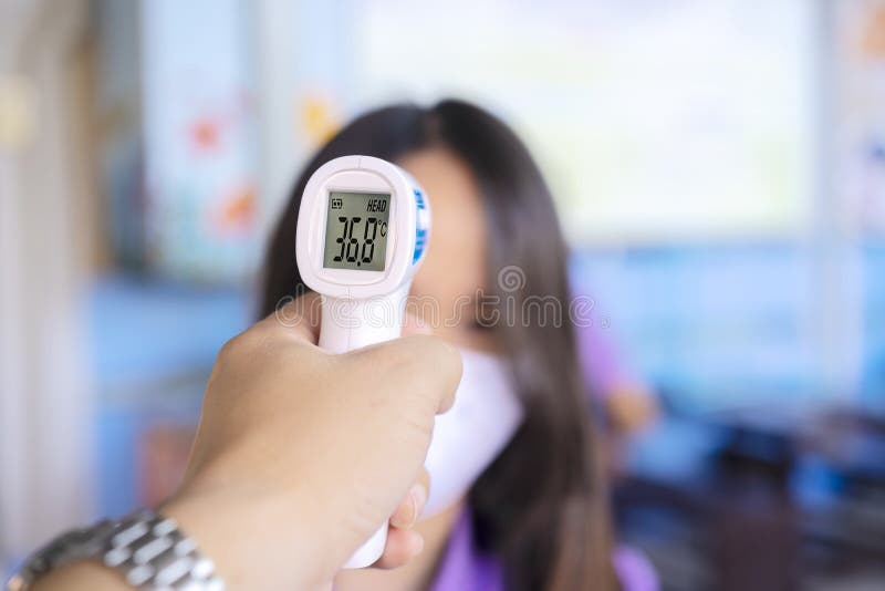 Operator Check Fever by Digital Thermometer Visitor at Information ...