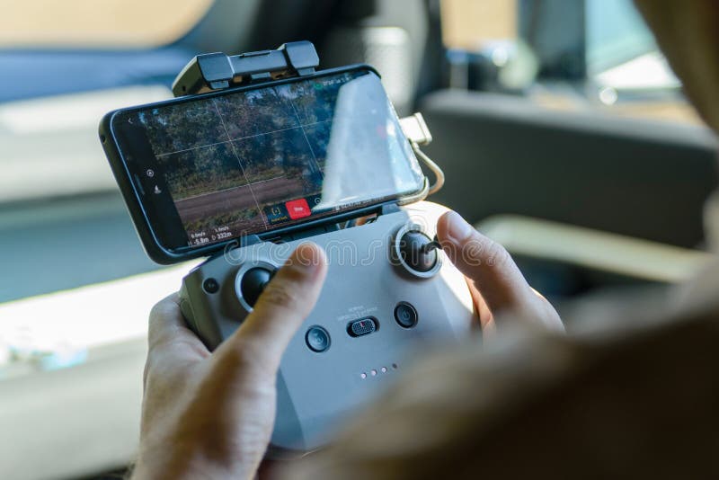 Operator Controls Drone by Smartphone in Hand Stock Photo - Image of ...