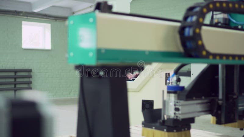 The Operator Controls the Operation of the CNC Machine. Stock Video ...