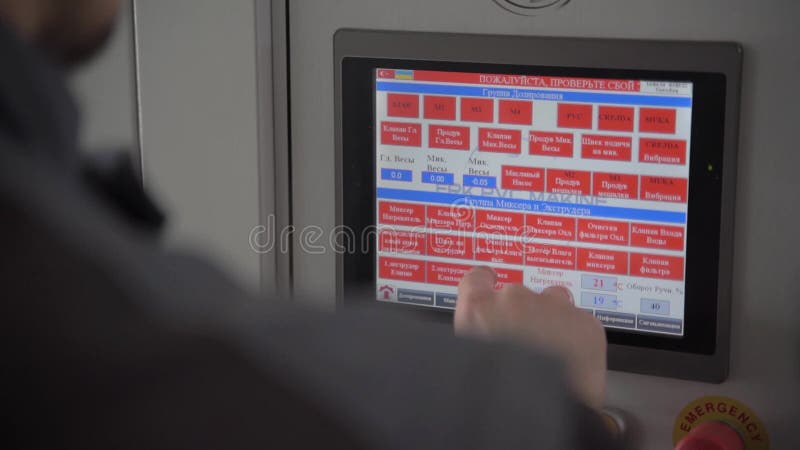 Operator Controls Production Line, Uses Computer with Screens Showing ...