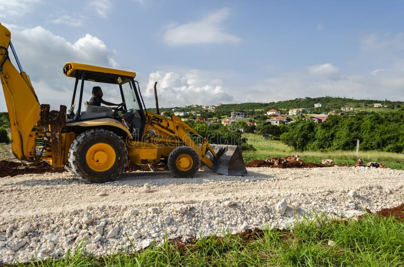 Operating a Front-end Loader on a Marl Road Stock Image - Image of ...