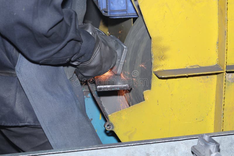 Operator grind workpiece stock photo. Image of grinding - 136564712