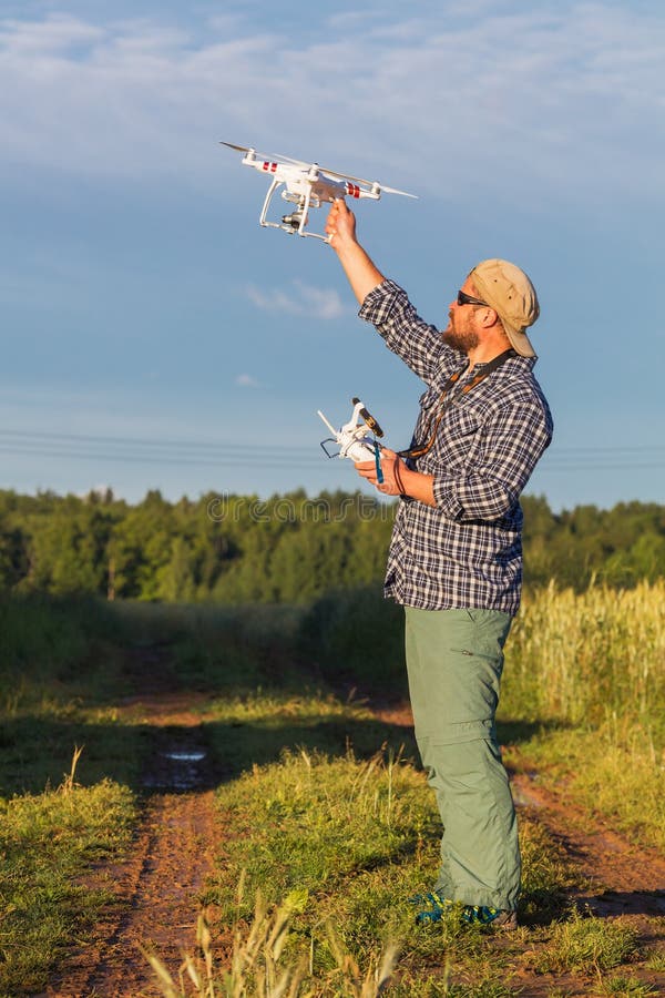 Operator Holding Drone and Controller in His Arms Stock Image - Image ...