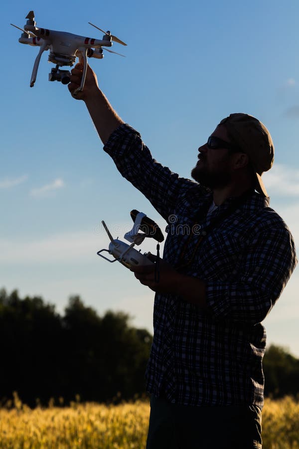 Operator Holding Drone and Controller in His Arms Stock Image - Image ...