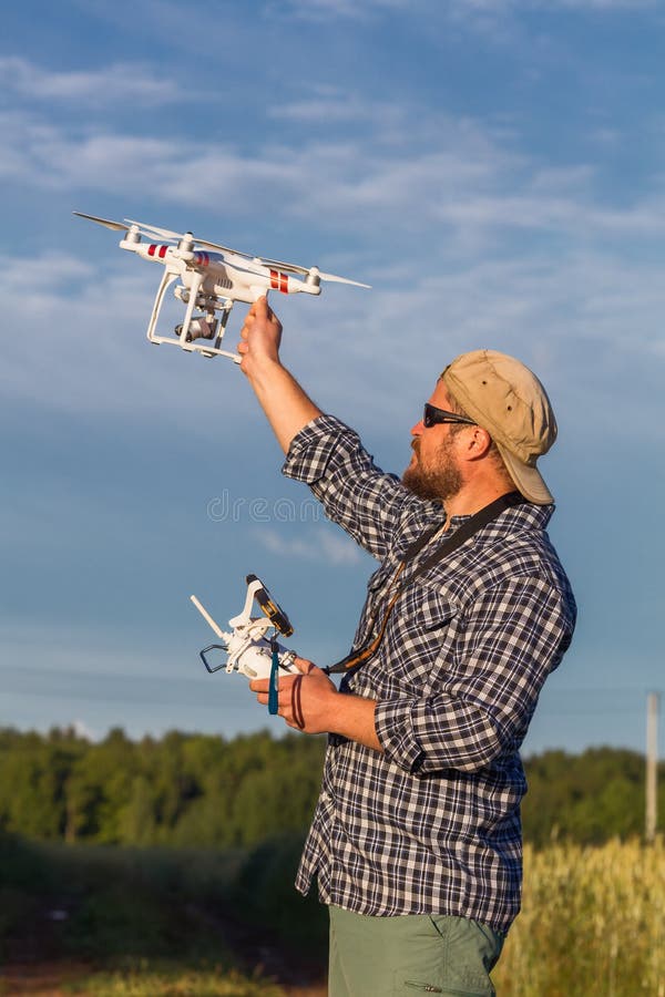 Operator Holding Drone and Controller in His Arms Stock Image - Image ...