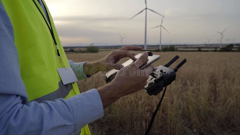 Operator Holding Remote Control Operating Drone Using Remote Controller ...