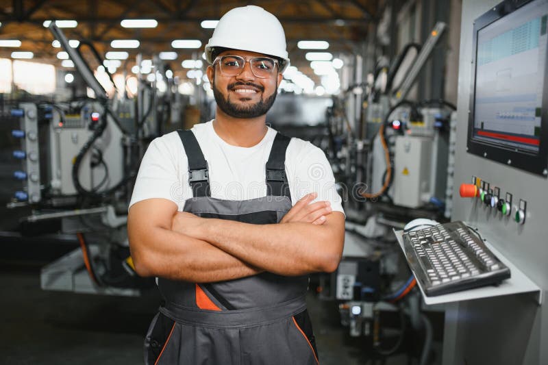 Operator of Machine. Industrial Worker Indoors in Factory Stock Photo ...