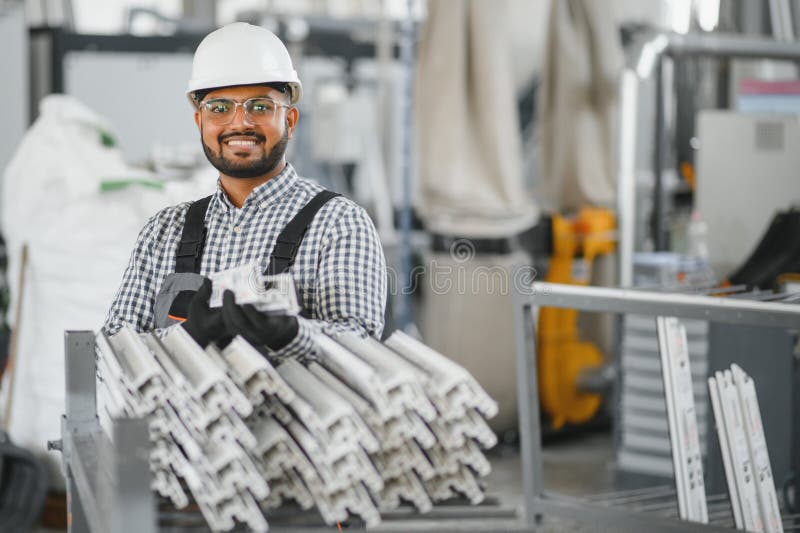 Operator of Machine. Industrial Worker Indoors in Factory Stock Photo ...