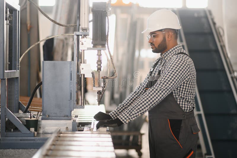 Operator of Machine. Industrial Worker Indoors in Factory Stock Image ...
