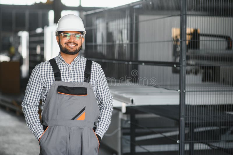 Operator of Machine. Industrial Worker Indoors in Factory Stock Photo ...