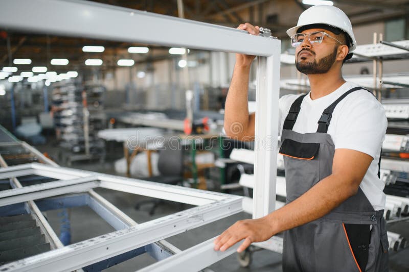 Operator of Machine. Industrial Worker Indoors in Factory Stock Image ...