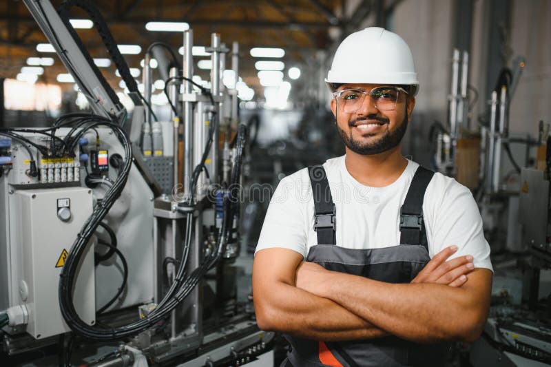 Operator of Machine. Industrial Worker Indoors in Factory Stock Photo ...