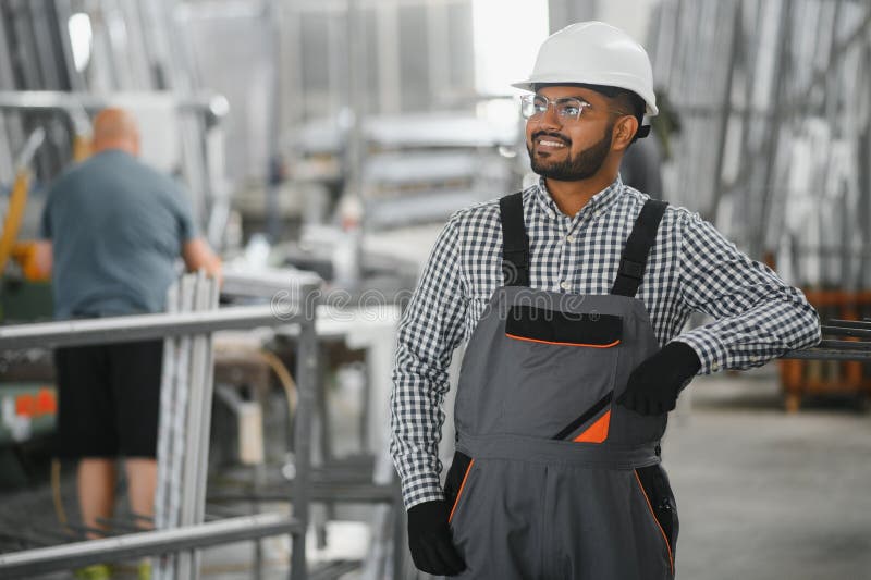 Operator of Machine. Industrial Worker Indoors in Factory Stock Photo ...