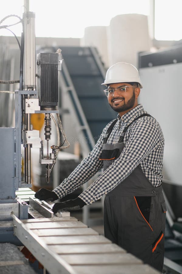 Operator of Machine. Industrial Worker Indoors in Factory Stock Image ...