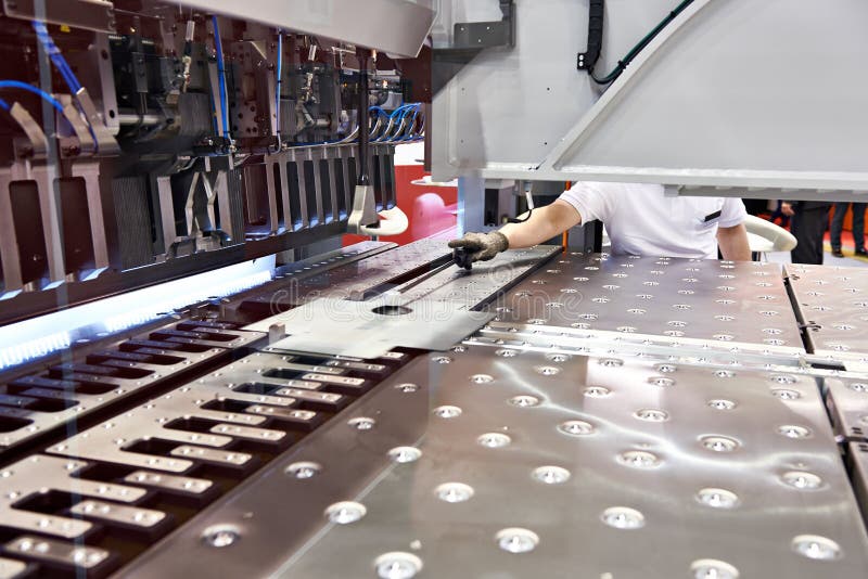 Operator of Machine Sets Workpiece into Automatic Panel Flexor Stock ...