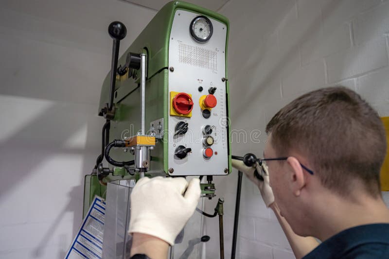 The Operator of a Mechanically Controlled Drilling Machine Switches ...