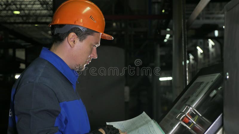 Operator Monitors Control Panel of Production Line. Manufacture of ...