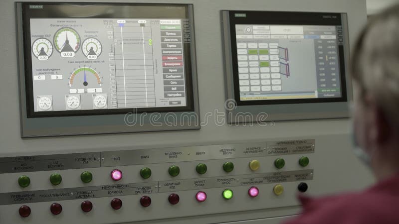 A Sophisticated Industrial Control Room with Advanced Digital Displays ...