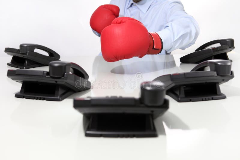 Operator in Office with Boxing Gloves and Phones on Desk Stock Photo ...