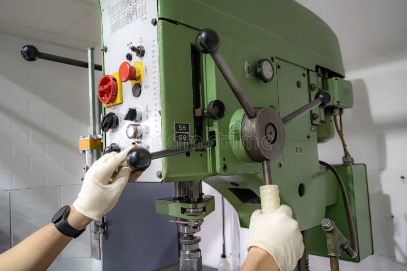 The Operator Operates a Mechanically Controlled Drilling Machine Stock ...