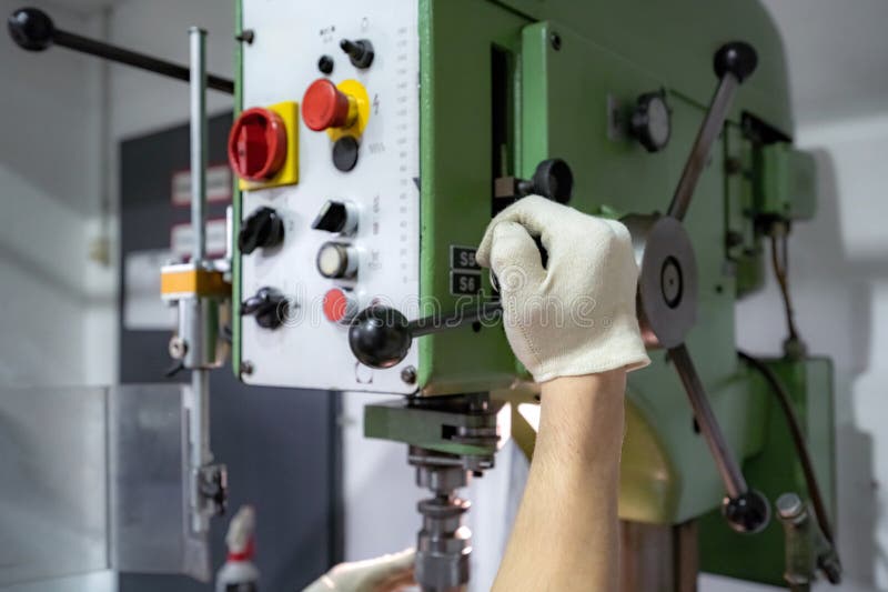 The Operator Operates a Mechanically Controlled Drilling Machine Stock ...