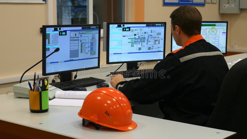 Operator at Plant Control Panel Monitors Parameters of Equipment at ...