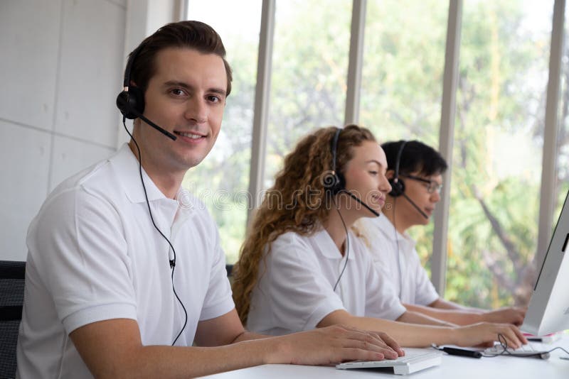 Operator Service Desk Consultant Talking and Smiling on Hands-free ... Operator Service Desk Consultant Talking and Smiling on Hands-free ...