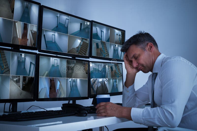 Operator Sleeping while Leaning on Desk Stock Photo - Image of record ...