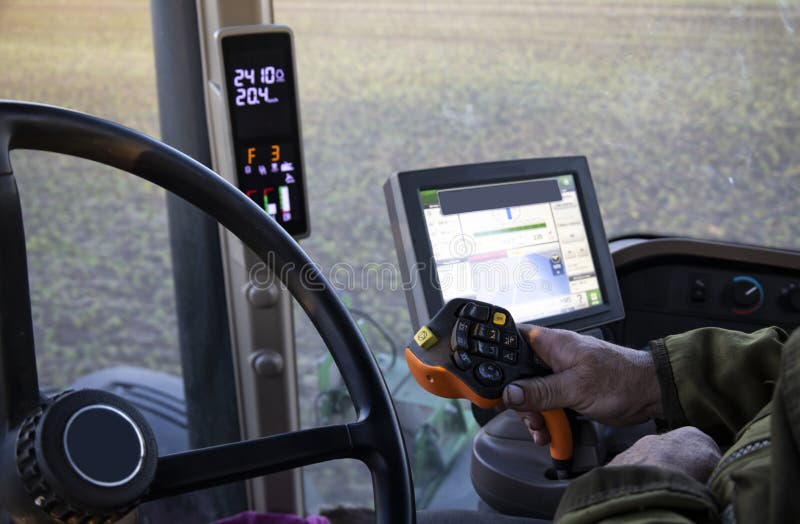 The Operator of the Special Tractor Processes Agricultural Fields ...