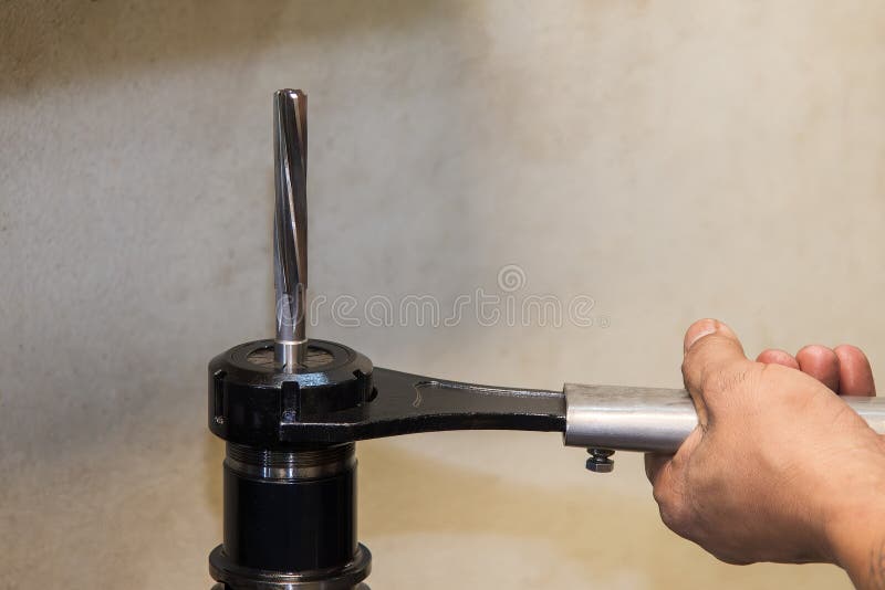 The Operator Tighten the Tool Holder by Spanner Stock Photo - Image of ...