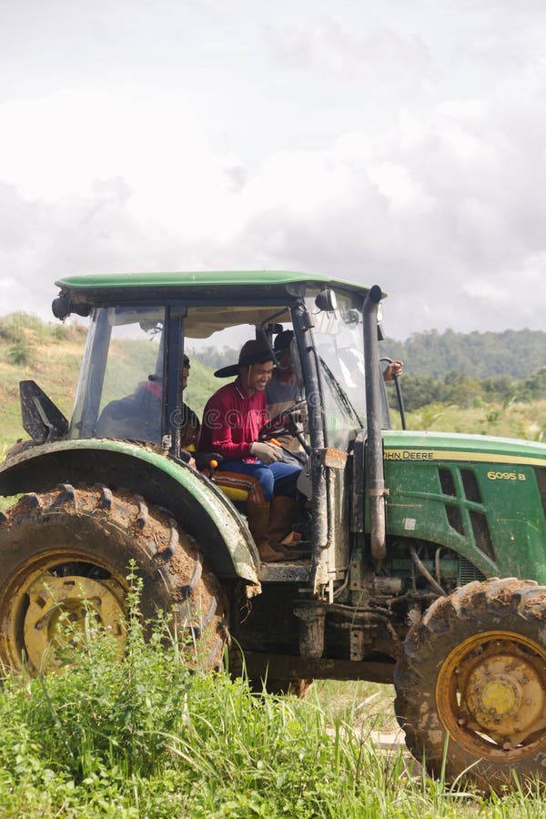 Operator Tractor editorial image. Image of smiling, plant - 240905535