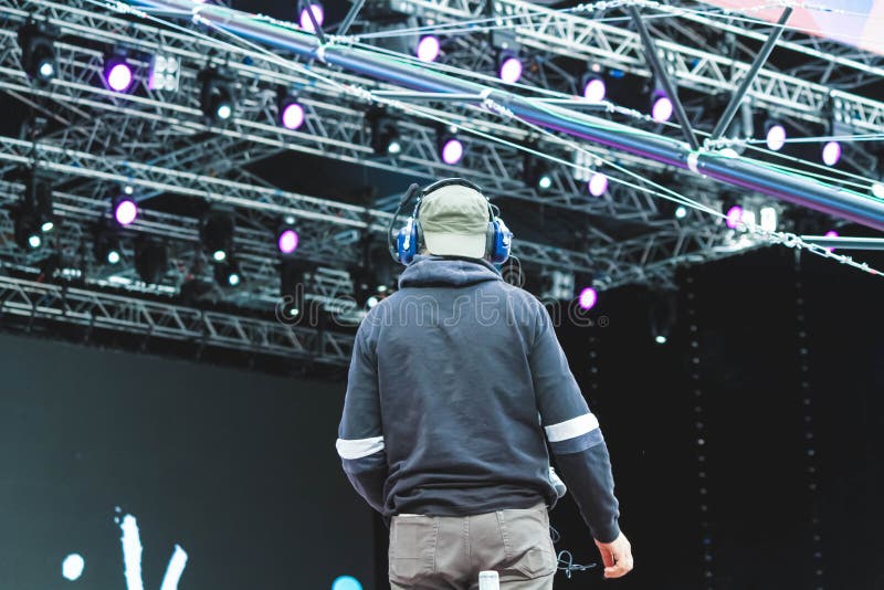 The Operator with a Video Camera Shoots a Concert. Shooting Video at ...