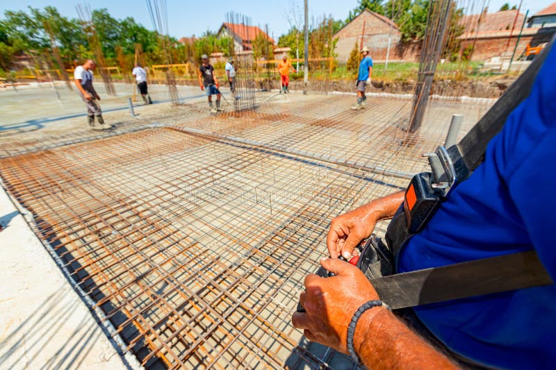 Worker is Holding Remote, Wireless, Control for Concrete Pump at ...
