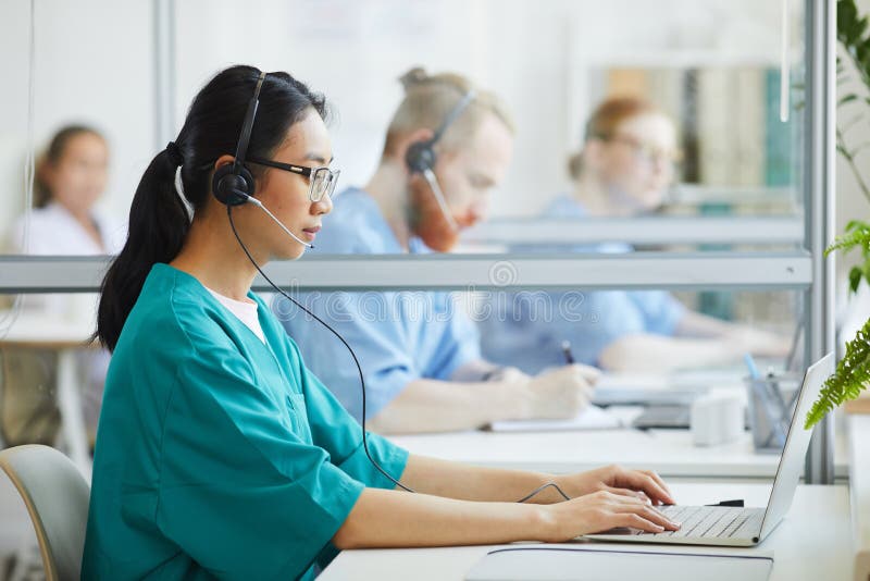 Operator Working at Hospital Stock Photo - Image of talking, confidence ...